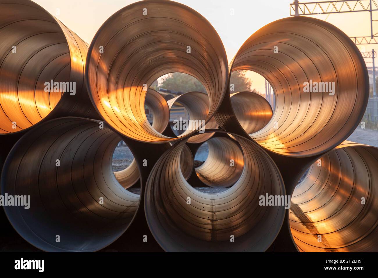 hollow large iron sewer pipes Stock Photo - Alamy