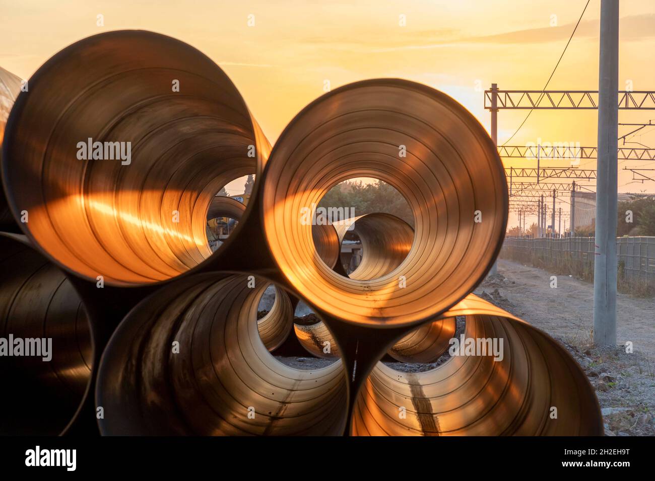hollow large iron sewer pipes Stock Photo - Alamy