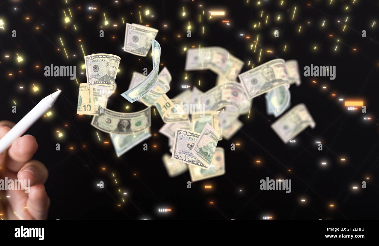Gold dollar flying in air hi-res stock photography and images - Alamy
