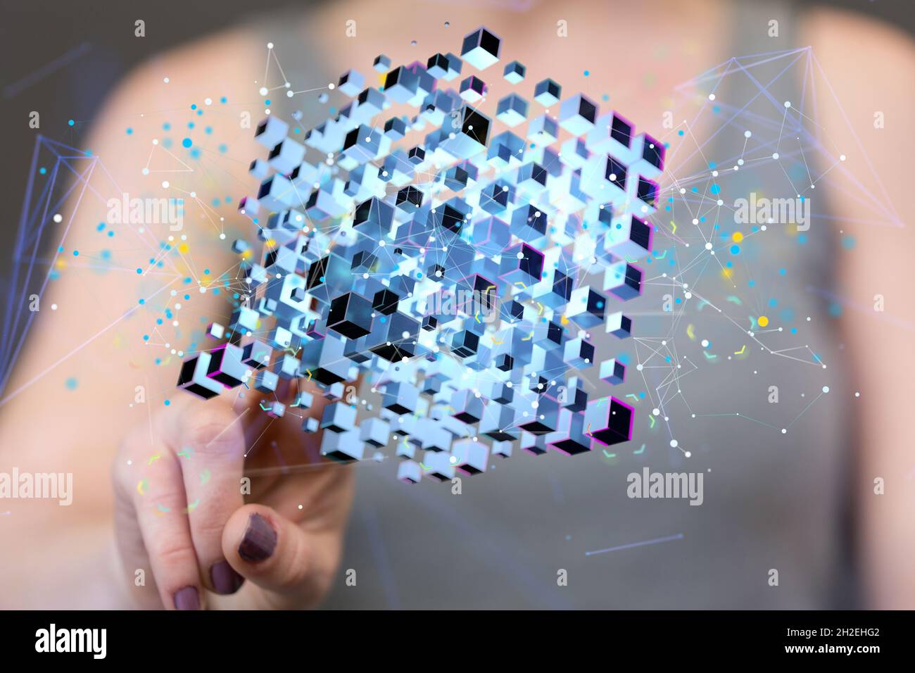 Human holding a virtual cube depicting information stored in a ...
