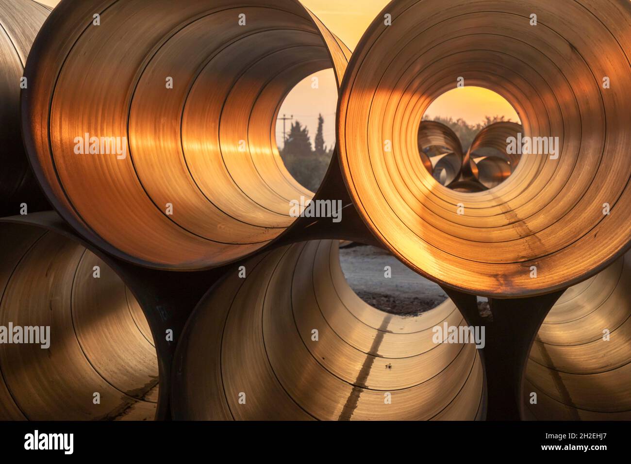 hollow large iron sewer pipes Stock Photo - Alamy