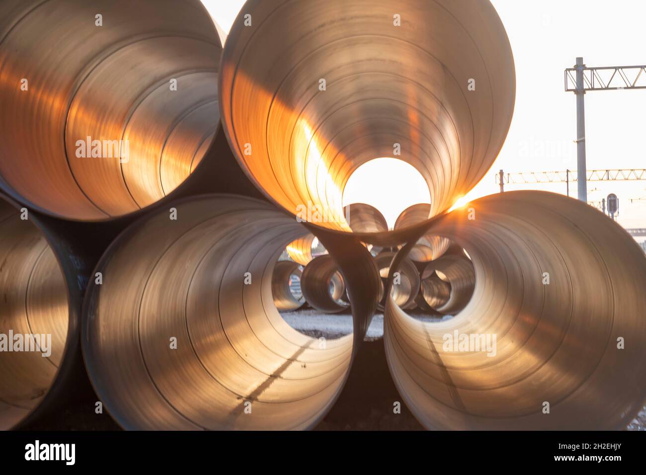 hollow large iron sewer pipes Stock Photo - Alamy