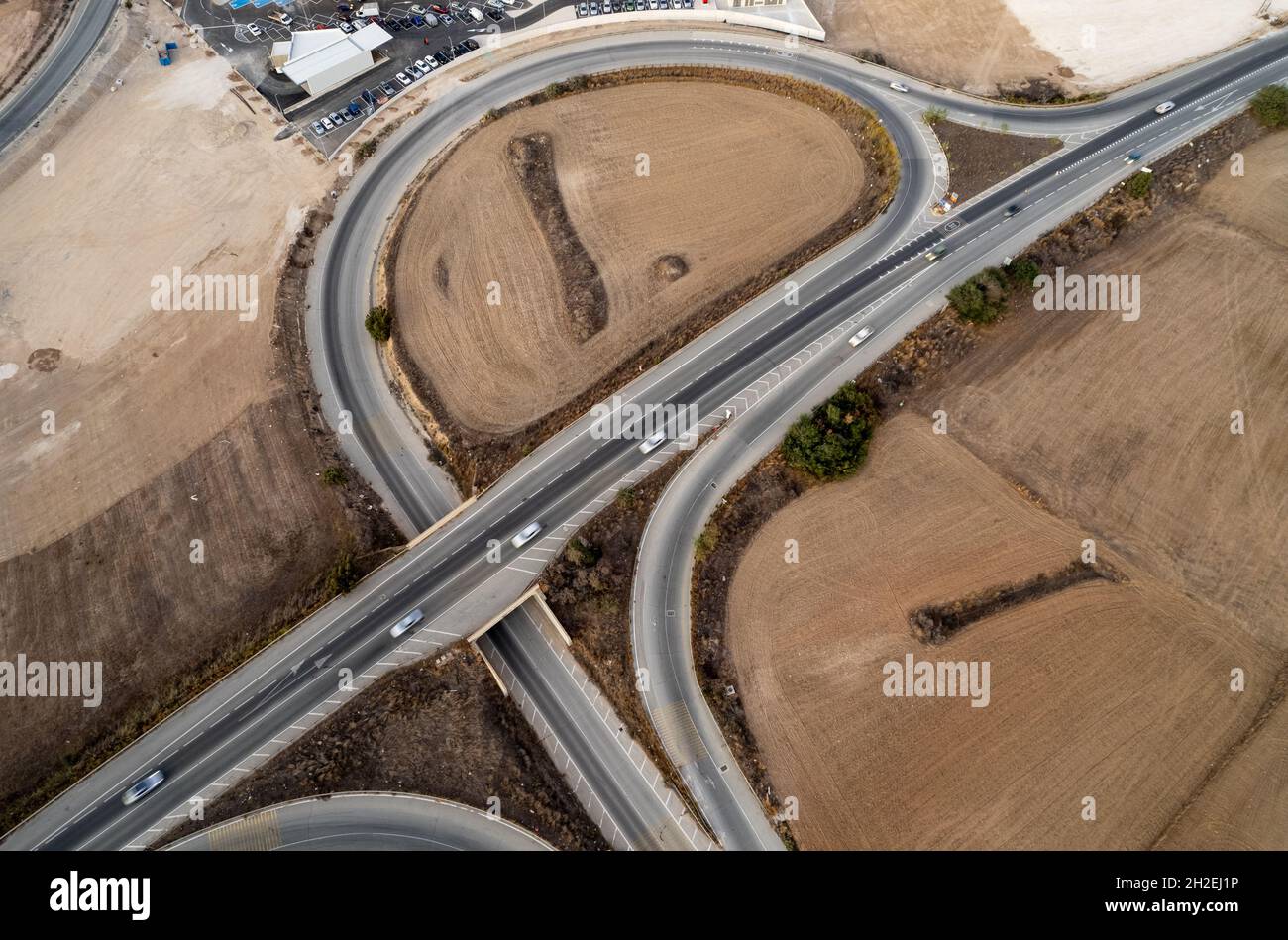 Aerial drone view of a modern designed highway public road. Road ...
