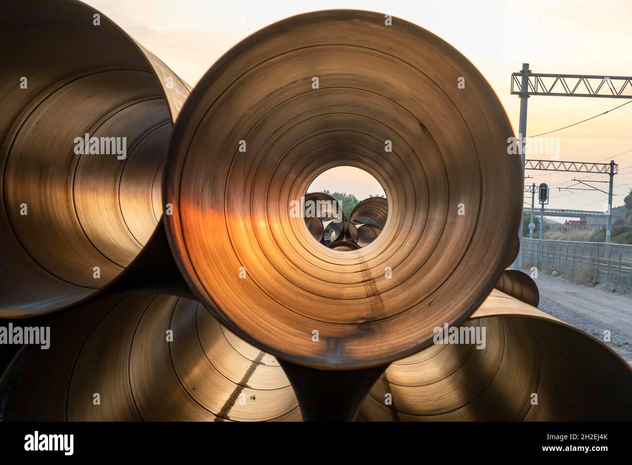 hollow large iron sewer pipes Stock Photo - Alamy