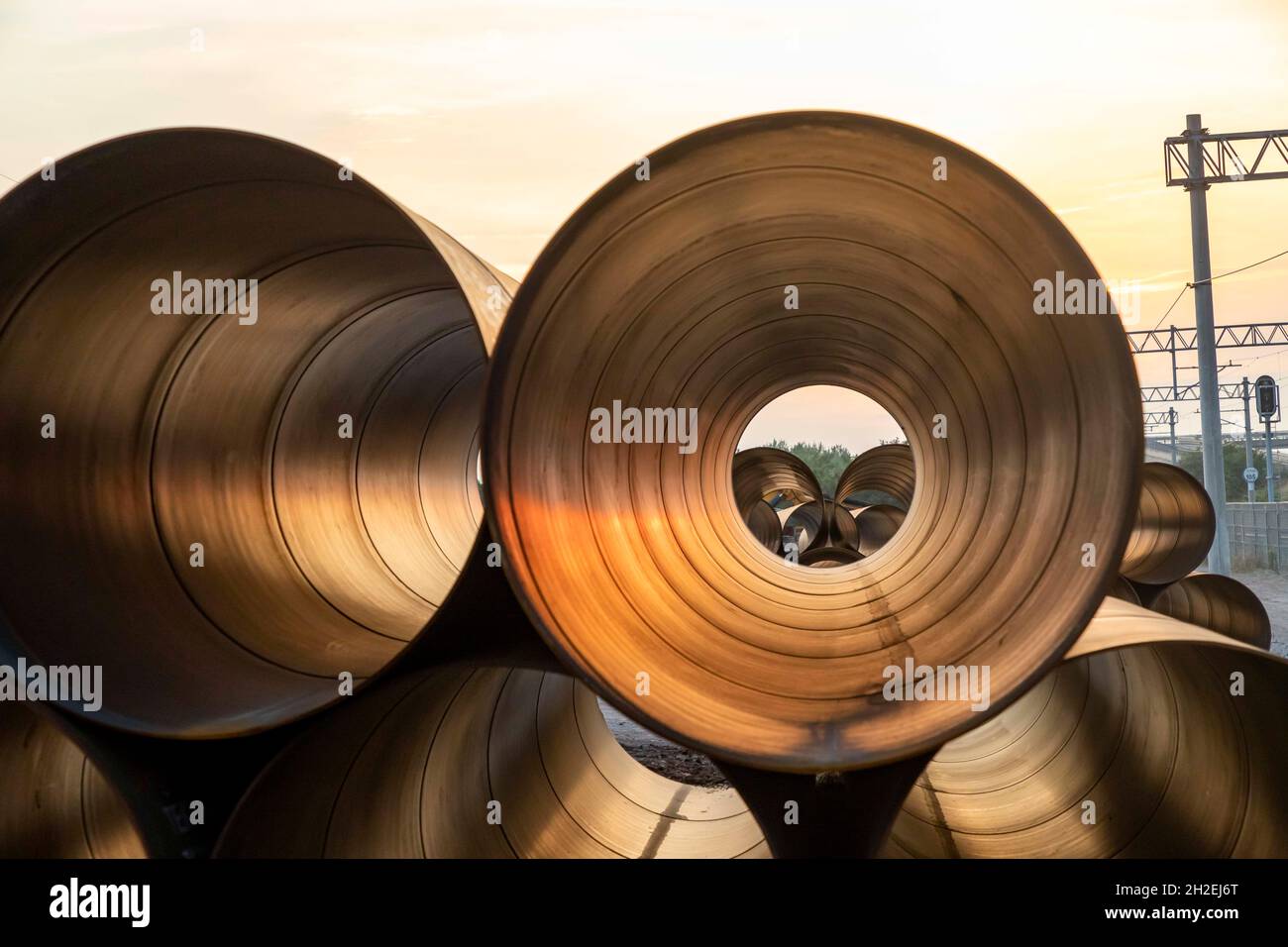 hollow large iron sewer pipes Stock Photo - Alamy