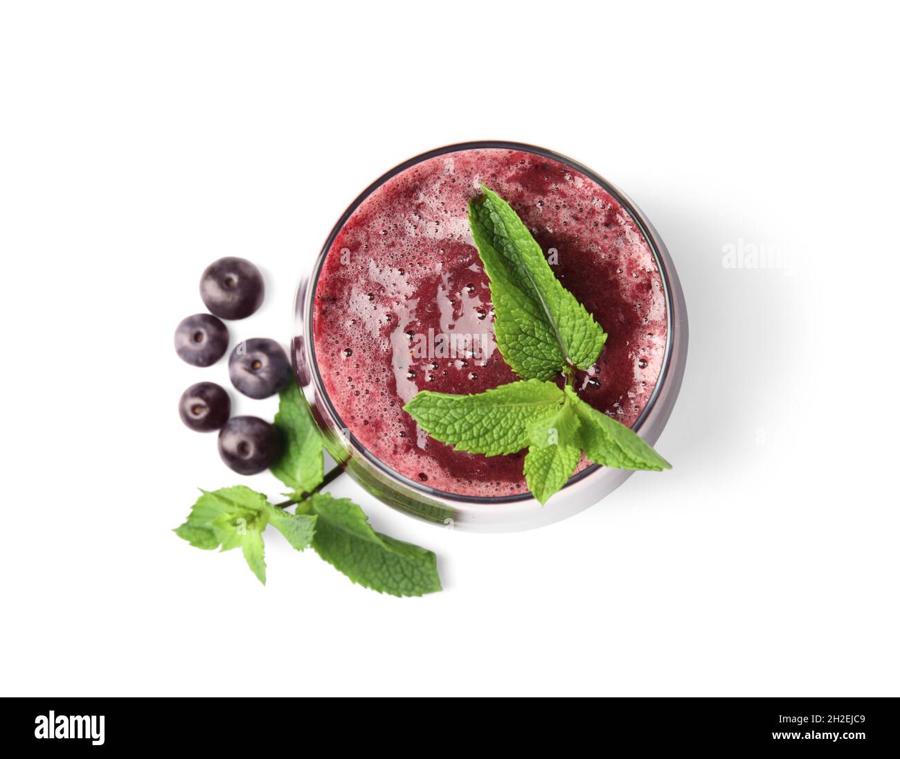 Glass with delicious acai smoothie on white background Stock Photo - Alamy