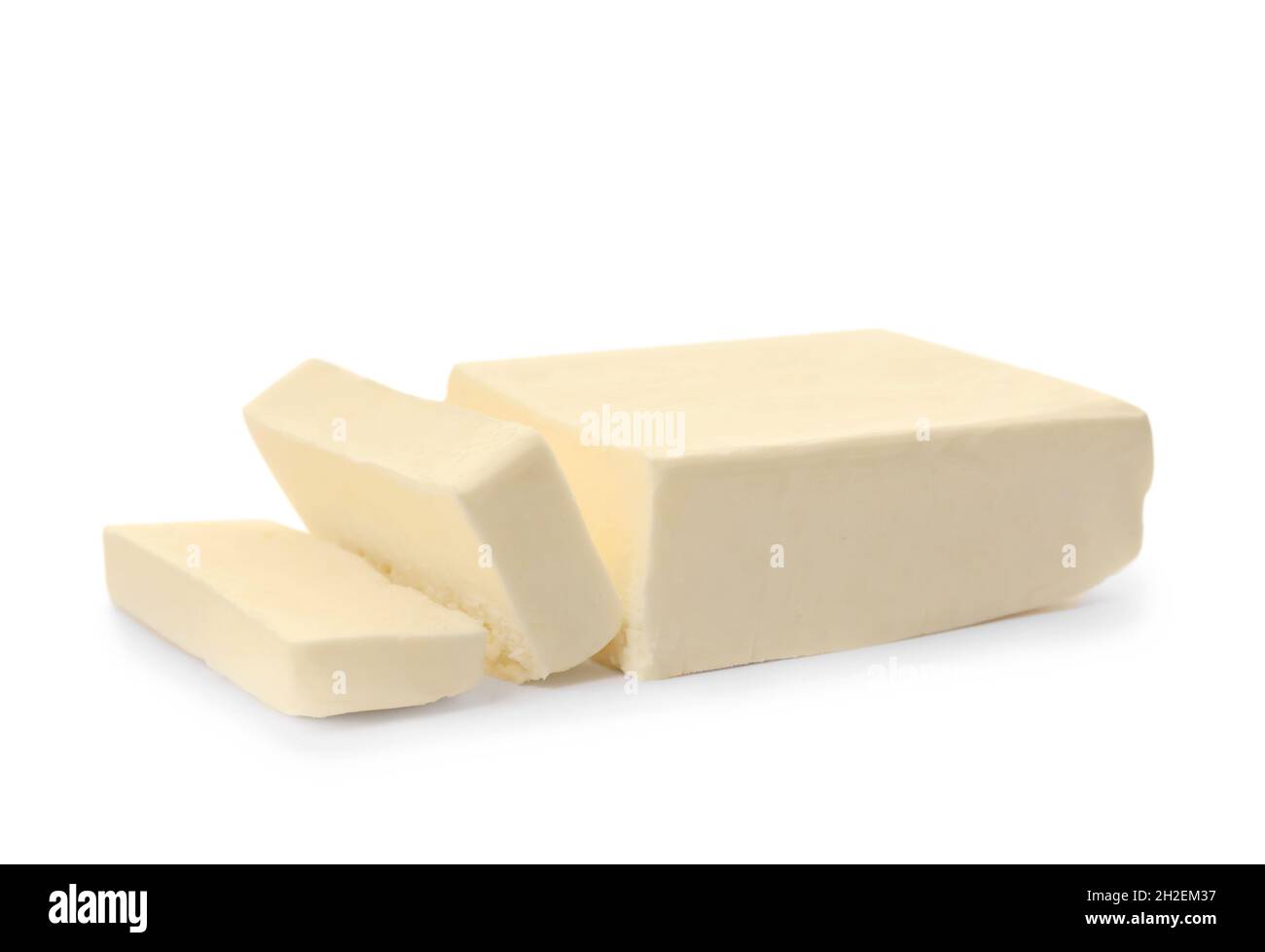 Tasty fresh cut butter on white background Stock Photo - Alamy