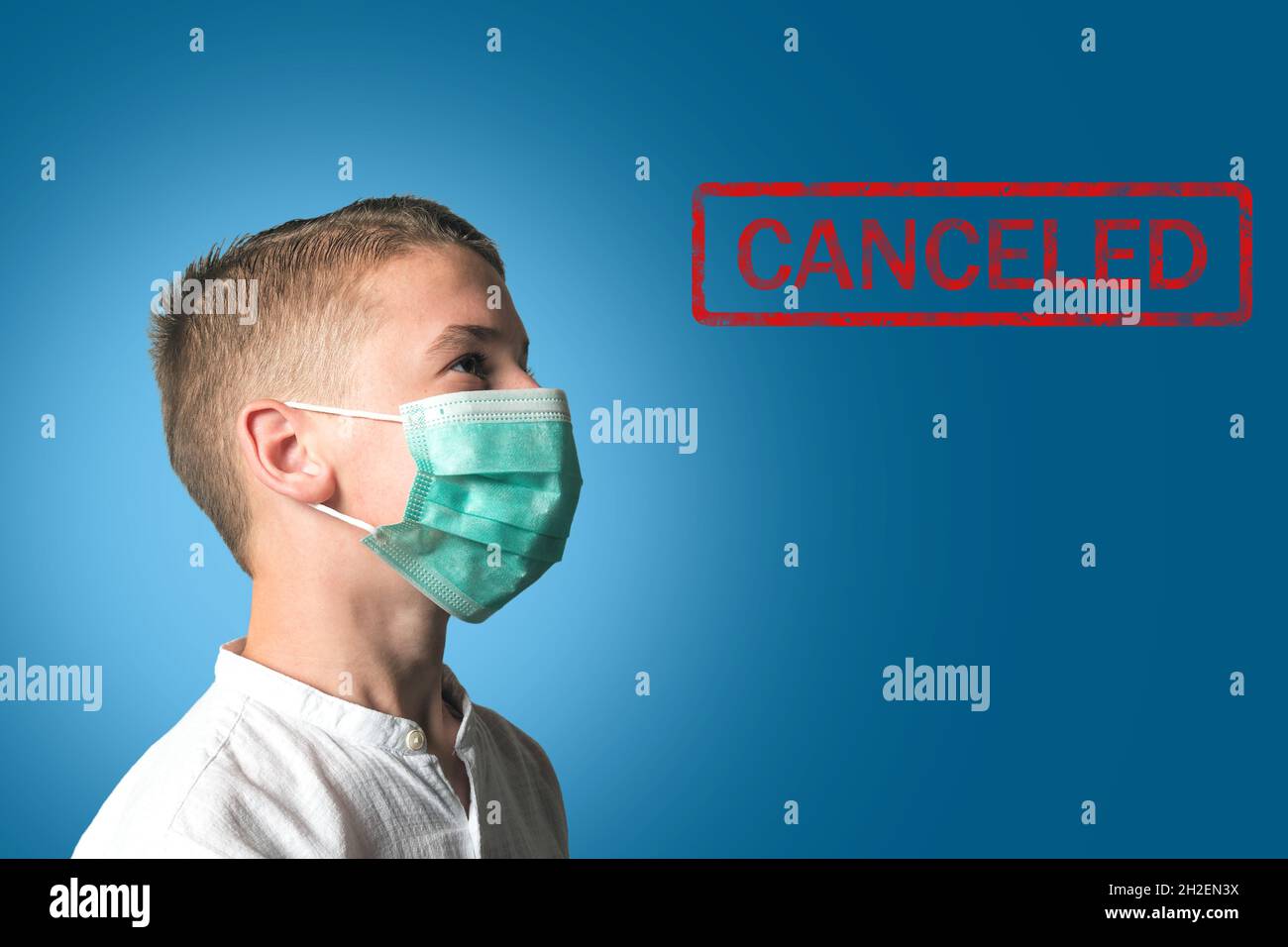 Boy in a medical mask on his face on bright background. Epidemic virus ...
