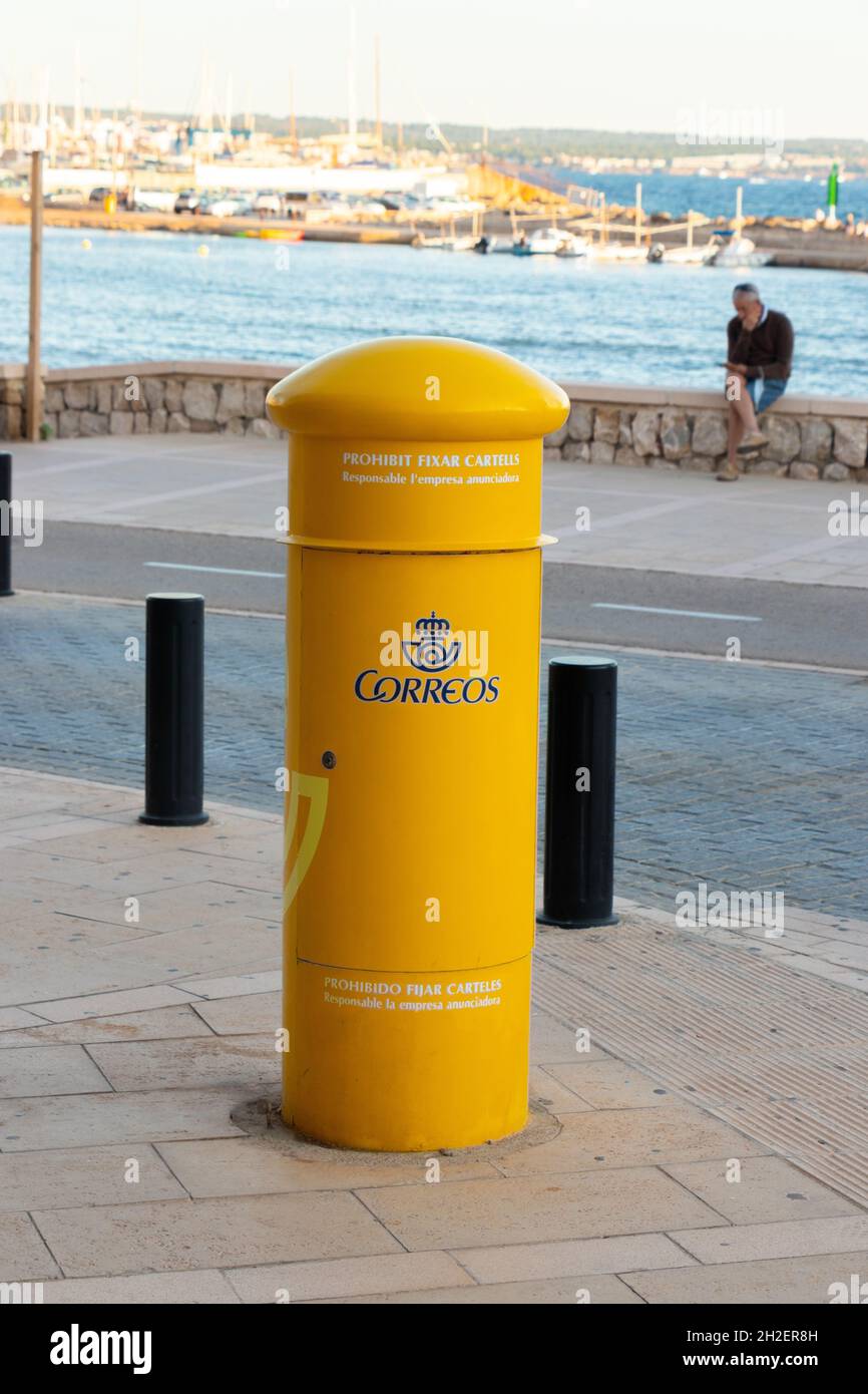 yellow Correos post box by the beach in Can Pastilla near Palma ...