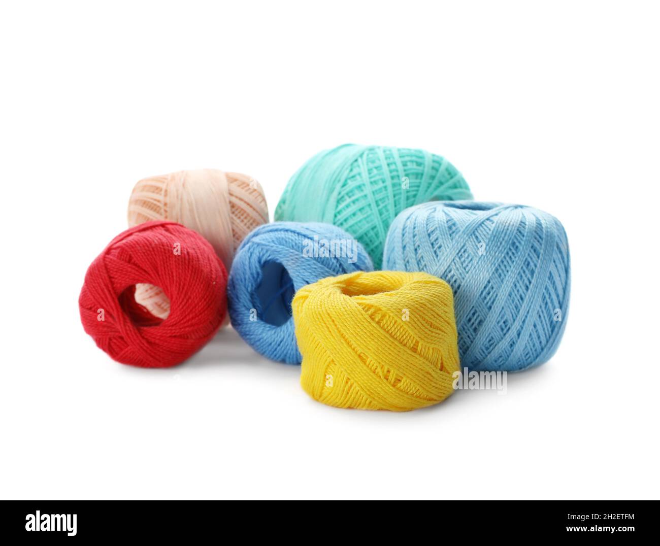 Color threads on white background Stock Photo - Alamy