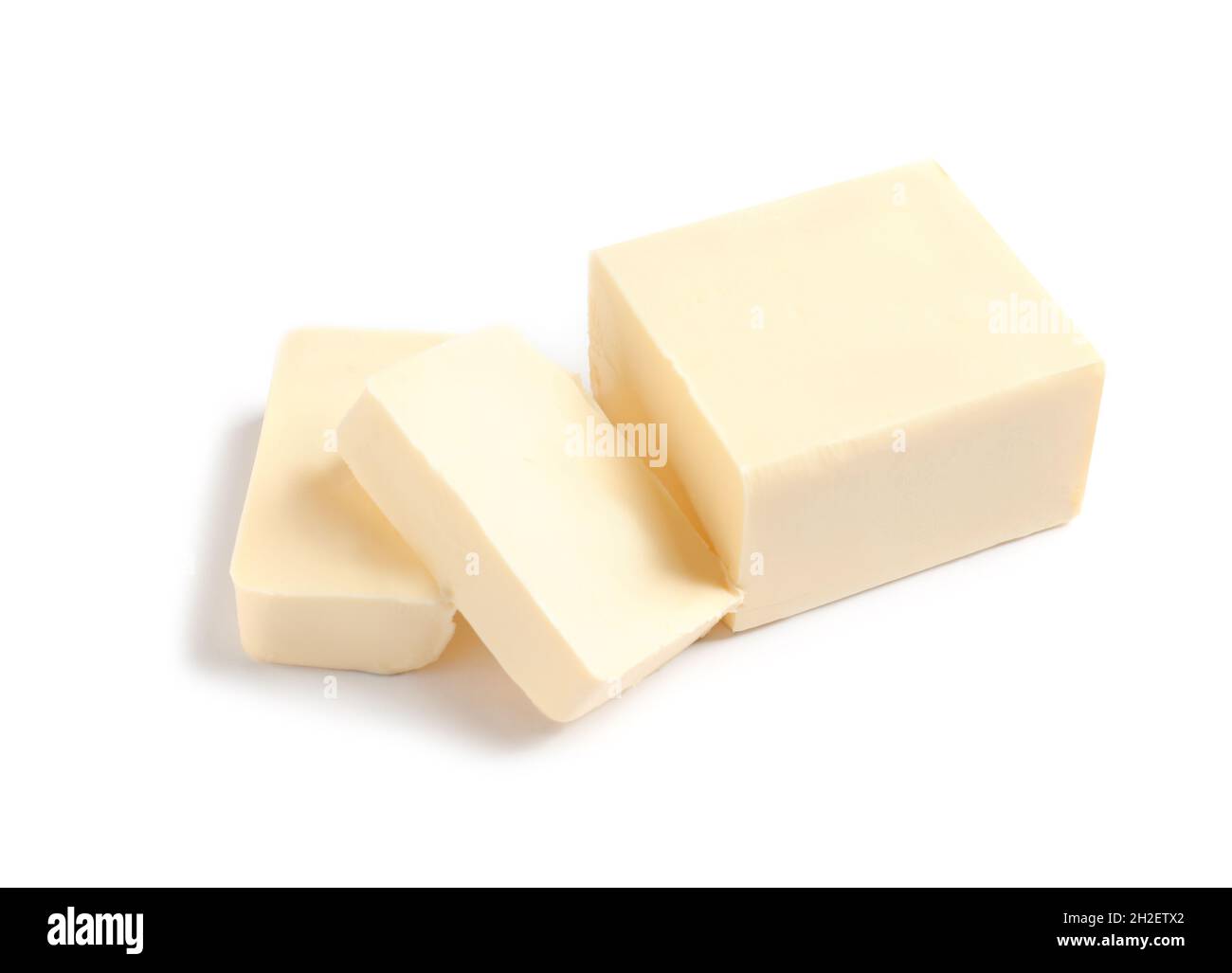 Cut block of fresh butter on white background Stock Photo - Alamy