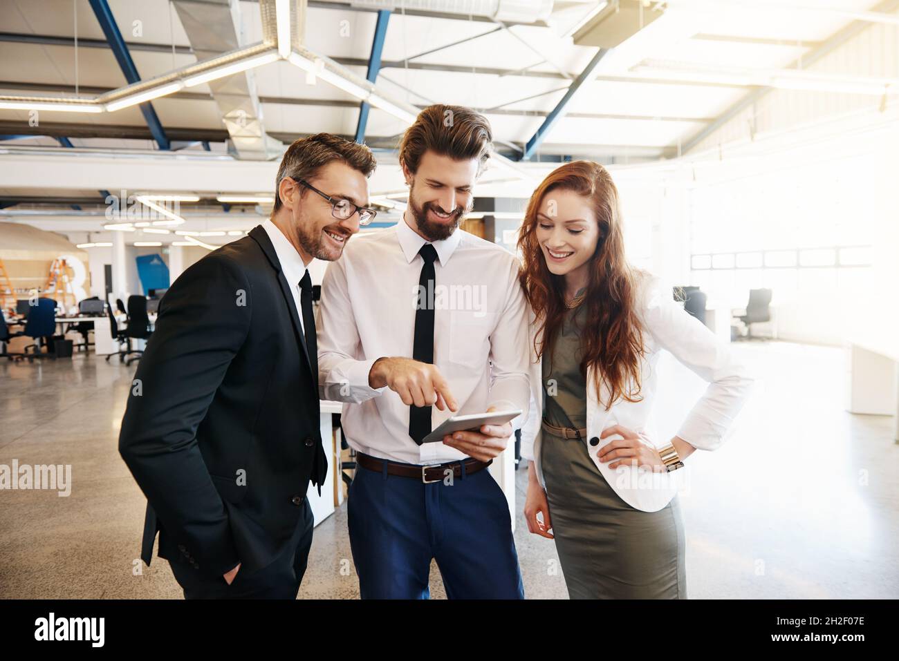 Drawing on each others expertise Stock Photo - Alamy