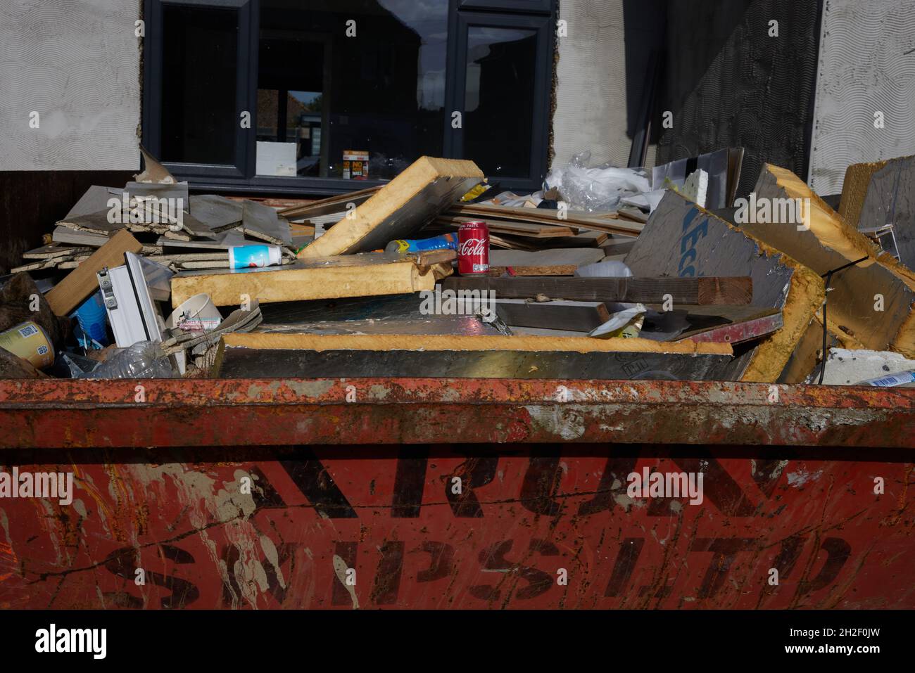 Building rubbish seen in a skip Stock Photo - Alamy