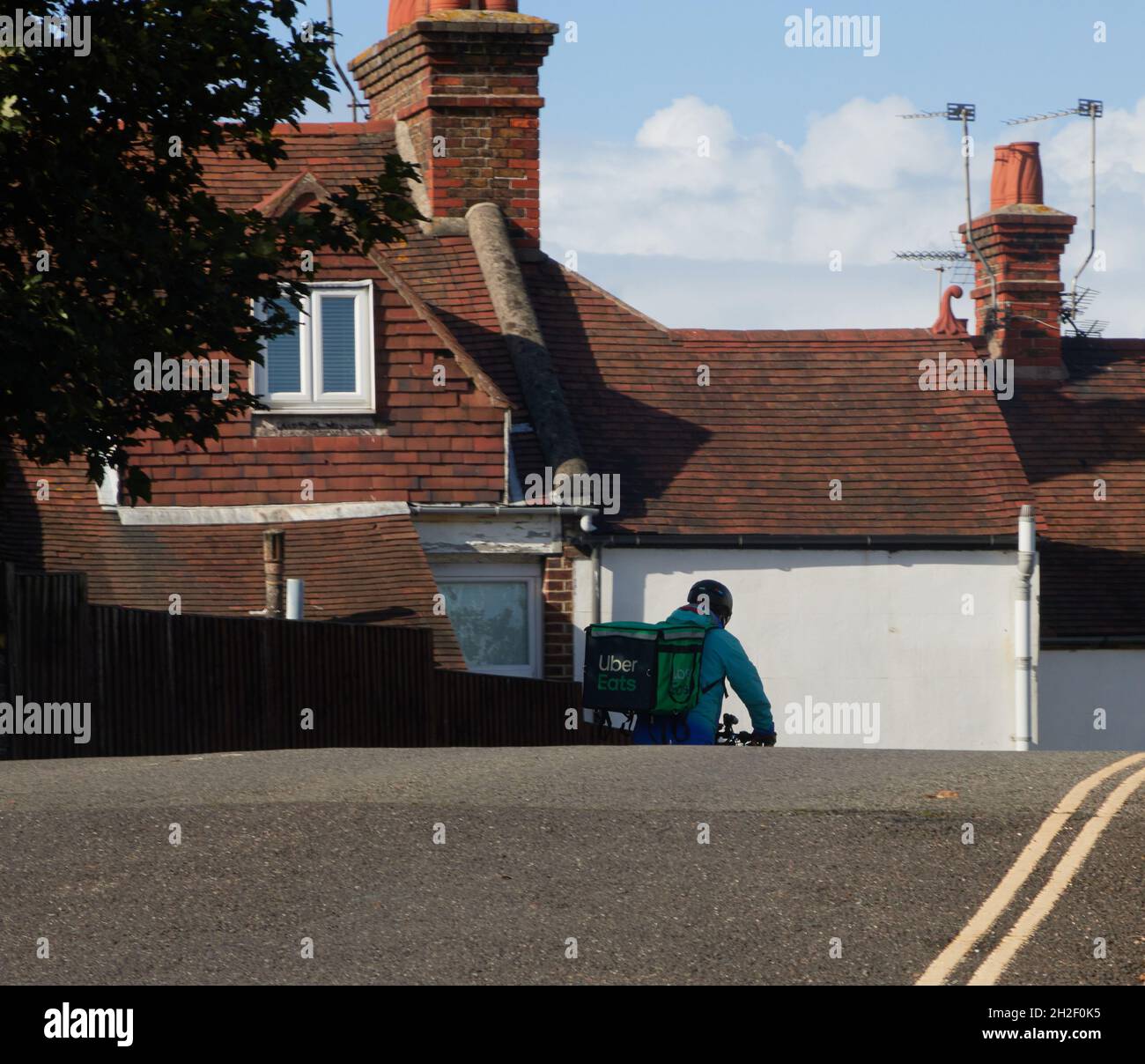 Uber Eats delivery driver seen with a large delivery box on his back ...