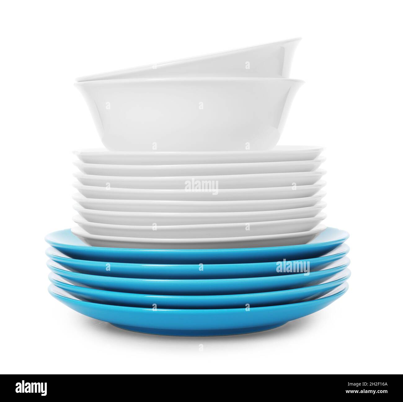 Stack of clean plates and bowls on white background. Washing dishes ...