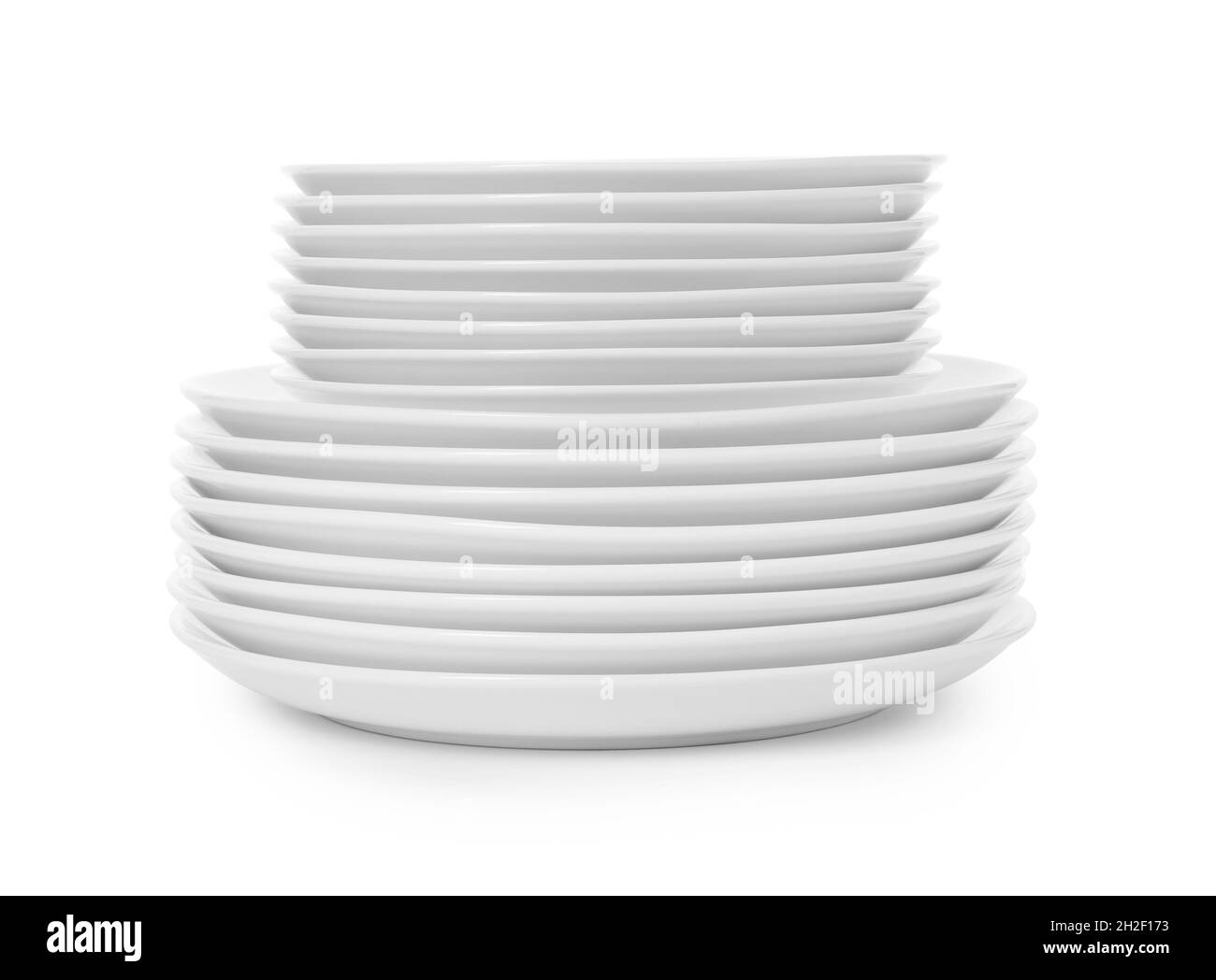 Stack of clean plates on white background. Washing dishes Stock Photo ...