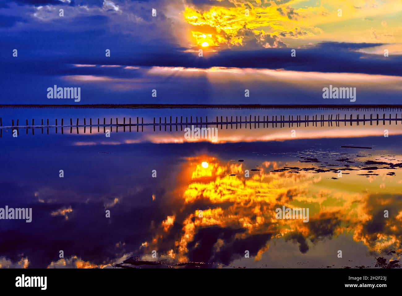 A landscape divided by the sun into light and shadow Stock Photo - Alamy