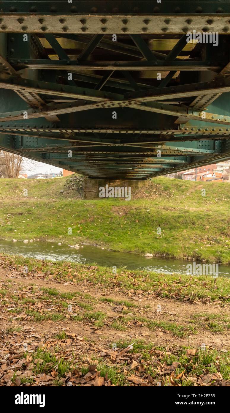 Old rusty truss bridge over the Orljava river. Low view Stock Photo - Alamy