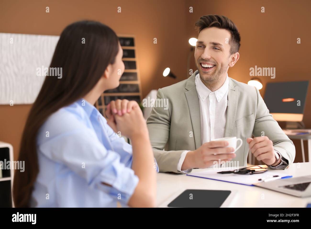 Human resources manager conducting job interview with applicant in office Stock Photo - Alamy