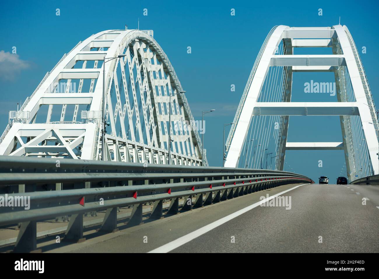 Cars go on the Crimean automobile bridge connecting the banks of the ...