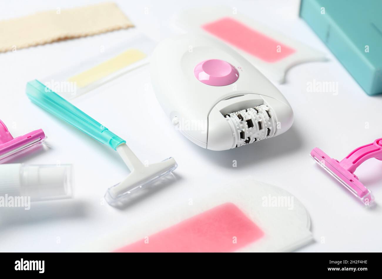 Set for epilation on white background Stock Photo - Alamy