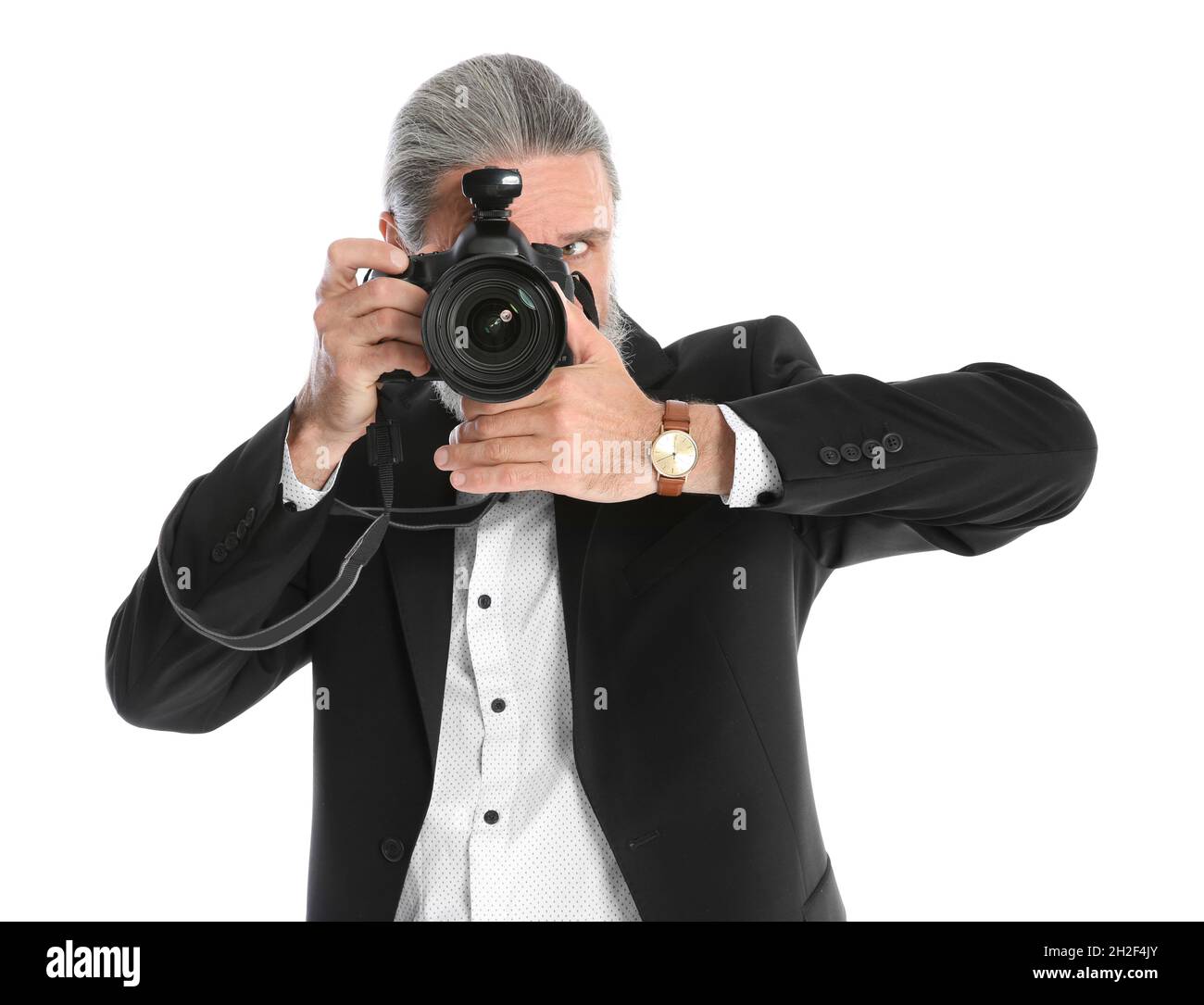 Male photographer with professional camera on white background Stock ...