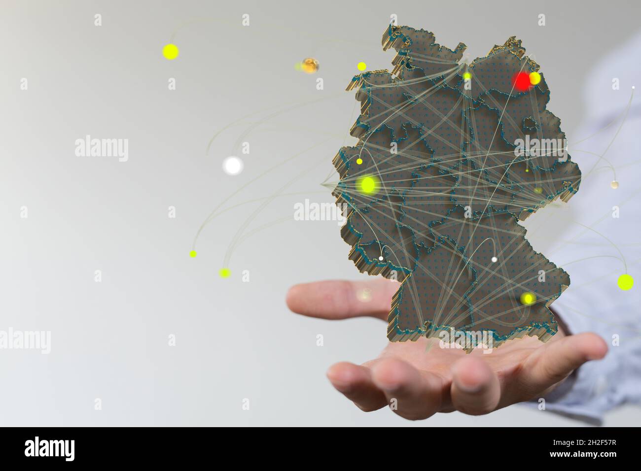 Human hand showing Germany map network Stock Photo - Alamy