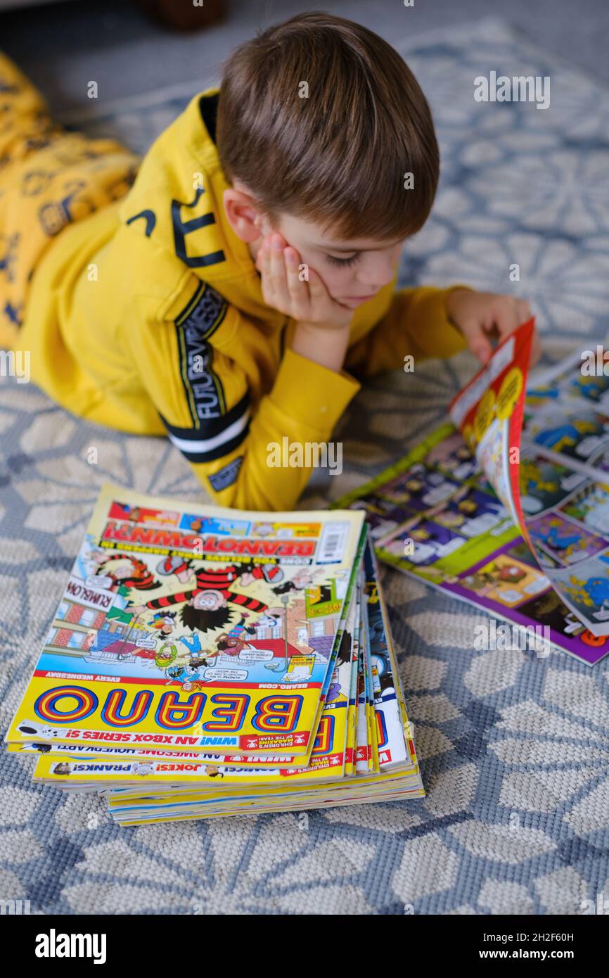Child reading Beano comic. The Beano is a British comic magazine ...