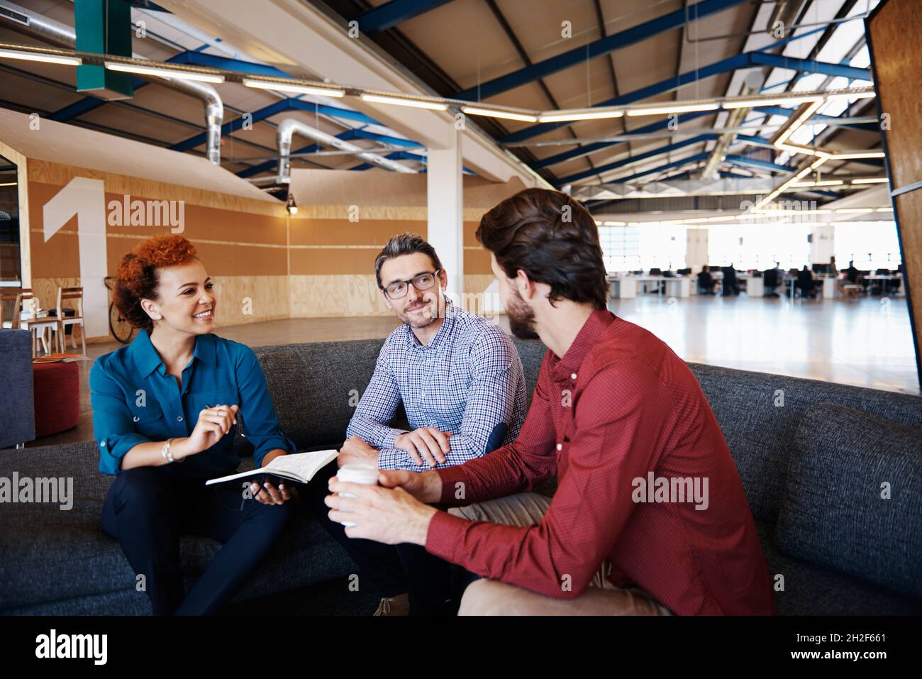 Focused on delivering results together Stock Photo - Alamy