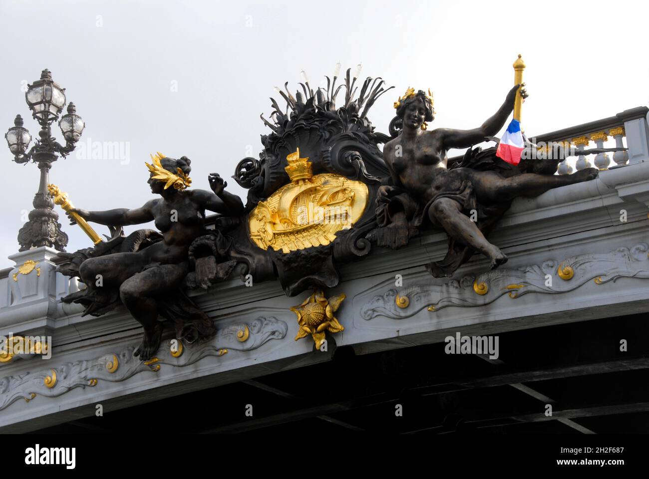 Decorative sculptures on the Pont Alexandre III bridge over the river ...