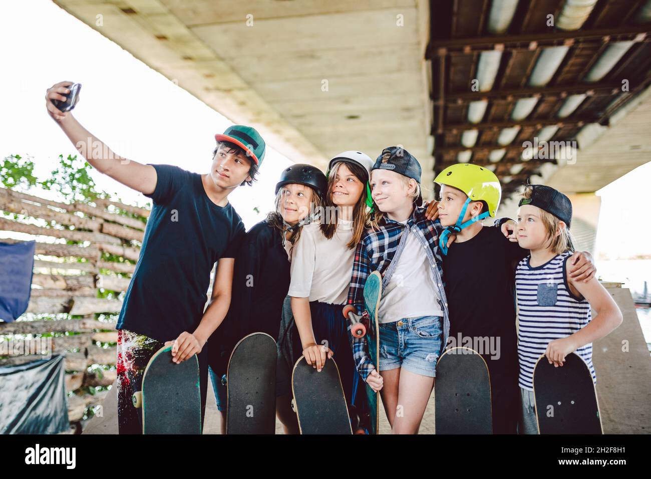 large group friends children skateboarders make videos, online ...