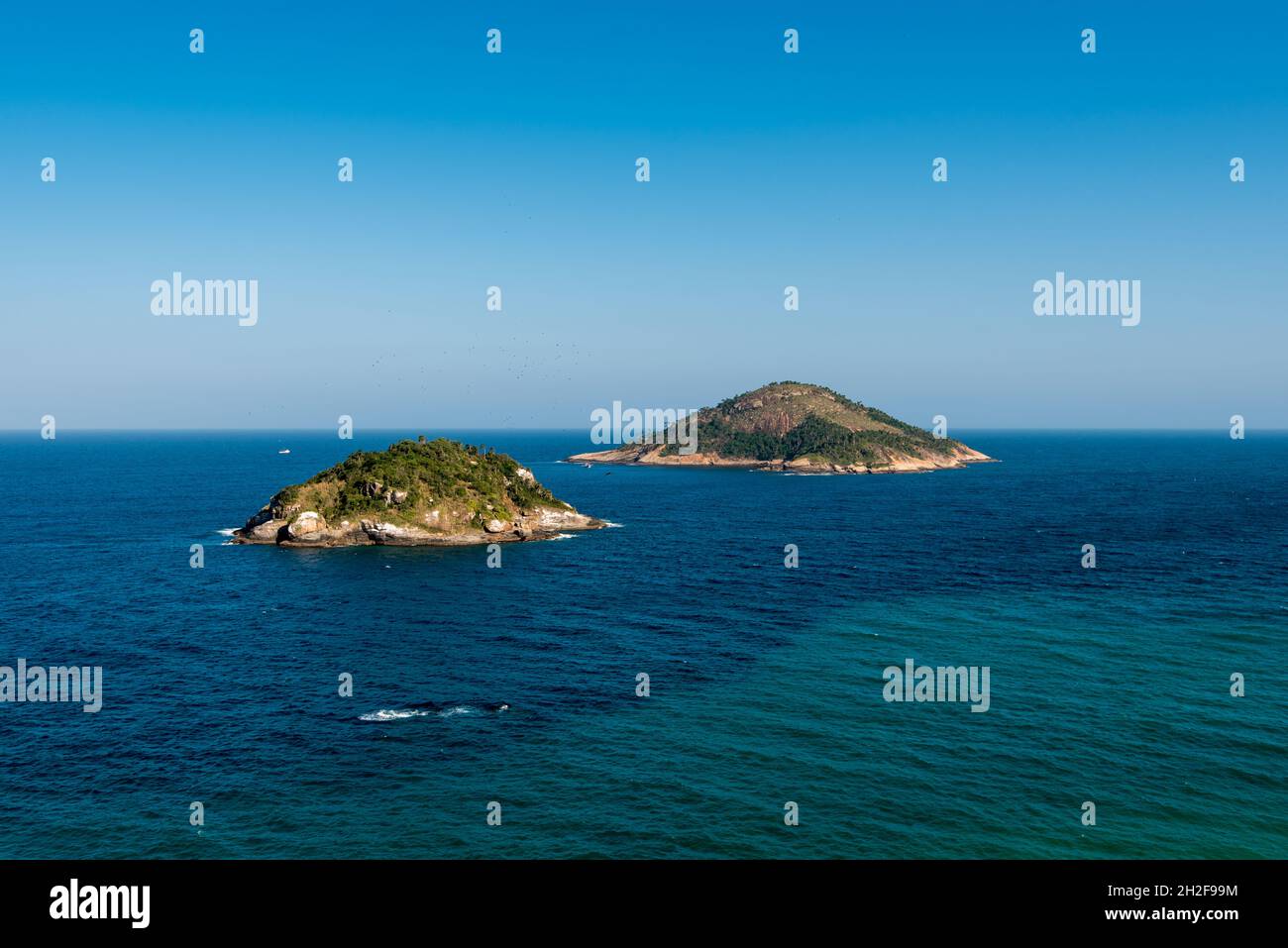 Aerial View of Two Rocky Islands in the Ocean Stock Photo - Alamy