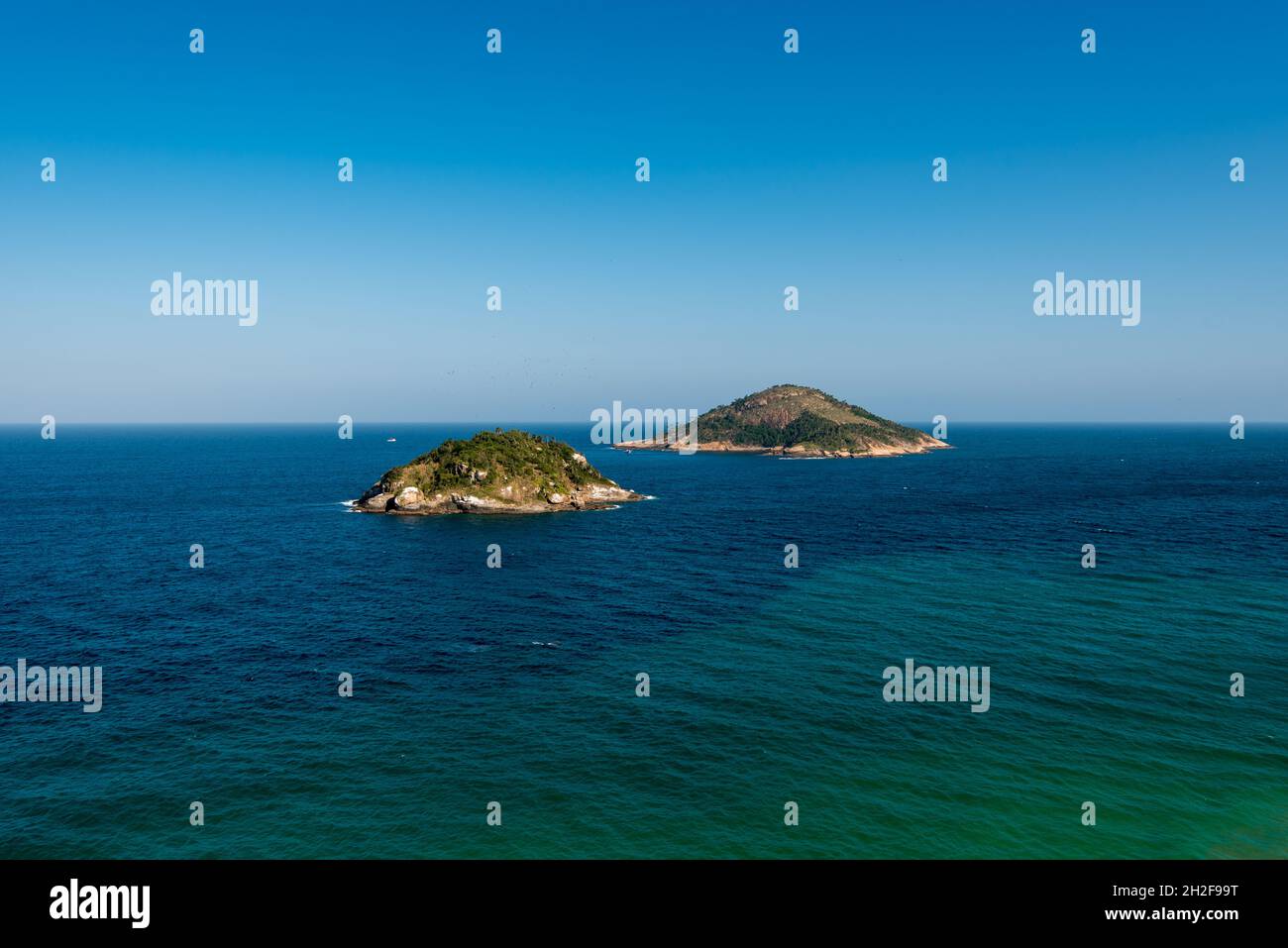 Aerial View of Two Rocky Islands in the Ocean Stock Photo - Alamy