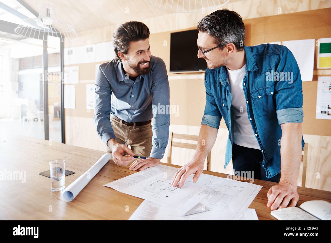 Double-checking the blueprints Stock Photo - Alamy