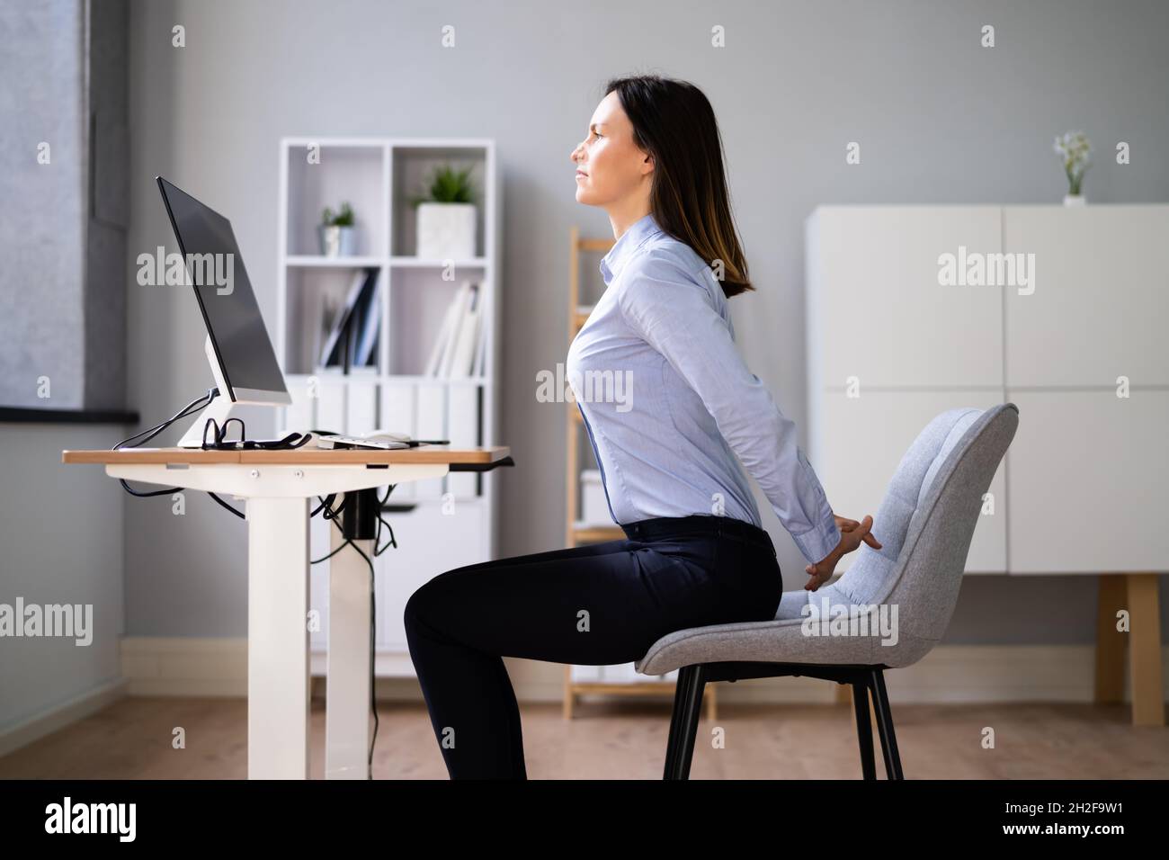 Woman stretch computer hi-res stock photography and images - Alamy
