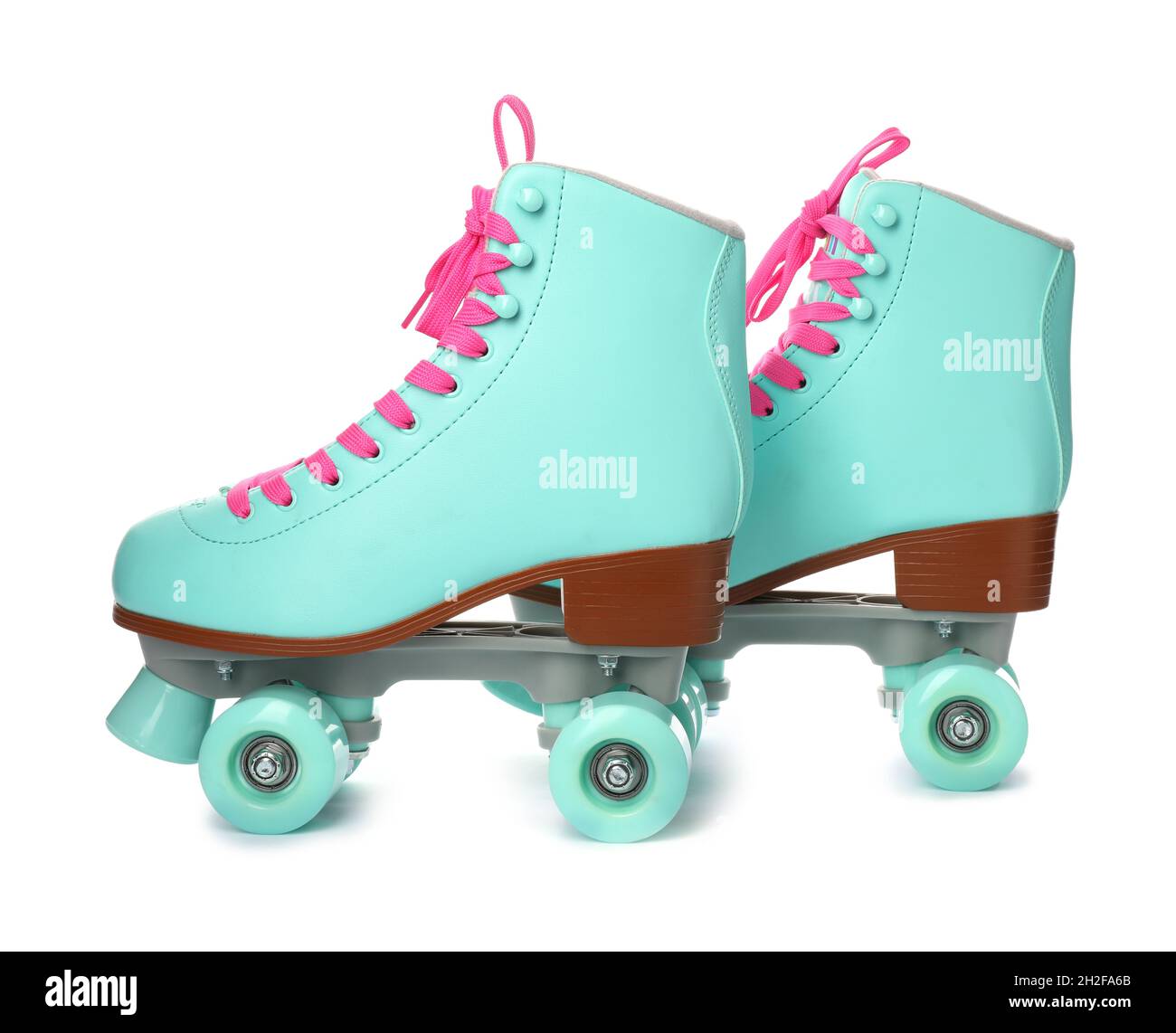 Pair of bright stylish roller skates on white background Stock Photo ...