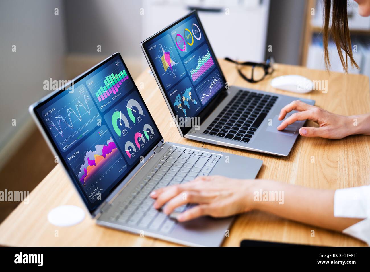 Analyst Woman Looking At Business Data Analytics Dashboard Stock Photo ...