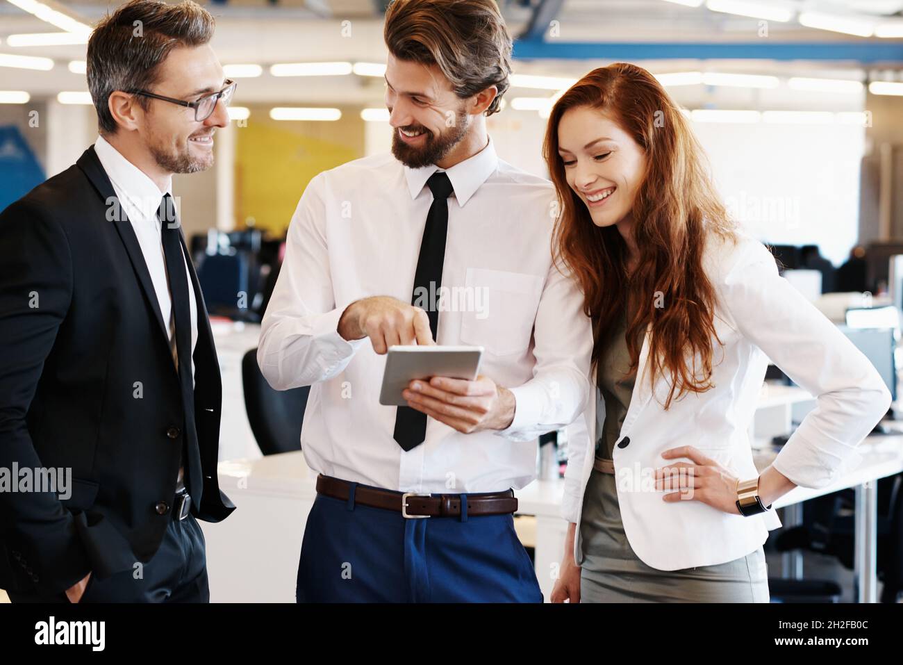 Three working as one Stock Photo - Alamy