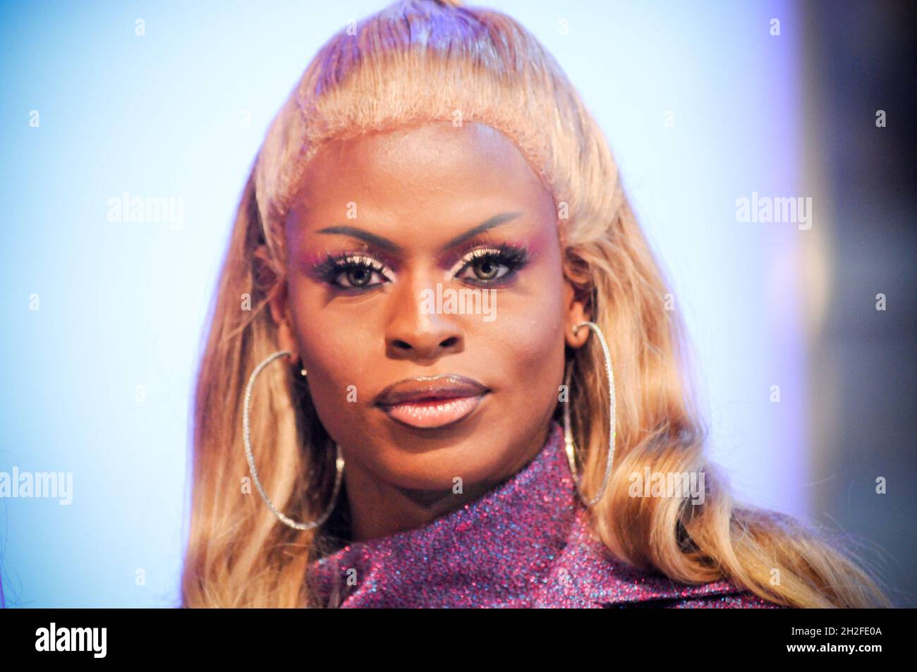Model Symone (Reggie Gavin) poses for photos at the Grand Staircase ...