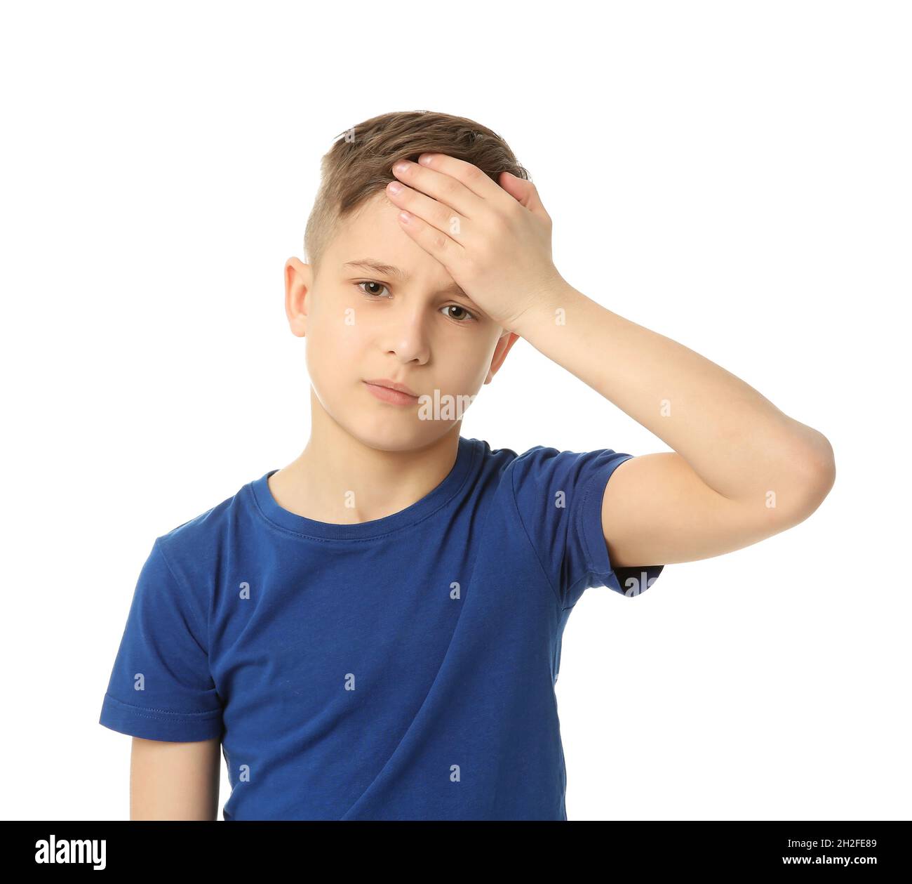 Little boy suffering from headache on white background Stock Photo - Alamy