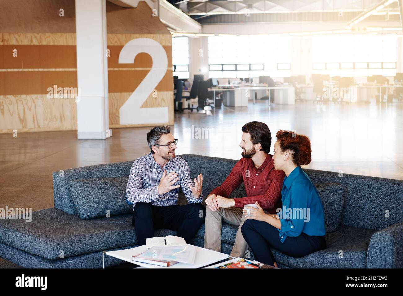 Growing and building their business together Stock Photo - Alamy