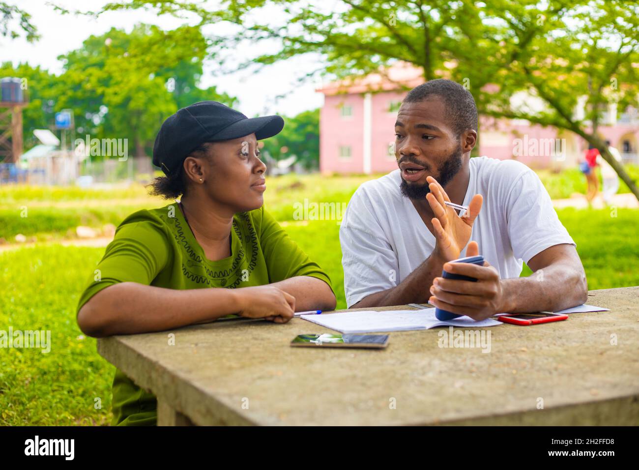 university student studying in the school environment Stock Photo - Alamy