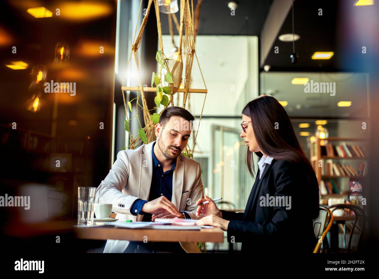 Business people explaining each other problem solutions Stock Photo - Alamy