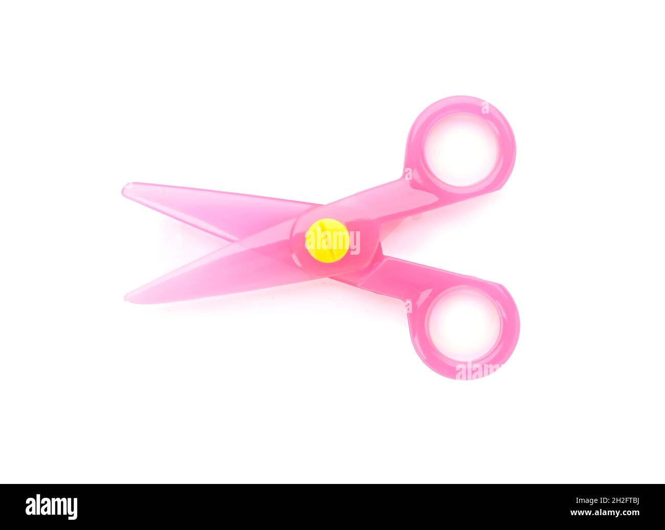 Pink plastic scissors on white background. Stationery for school Stock ...