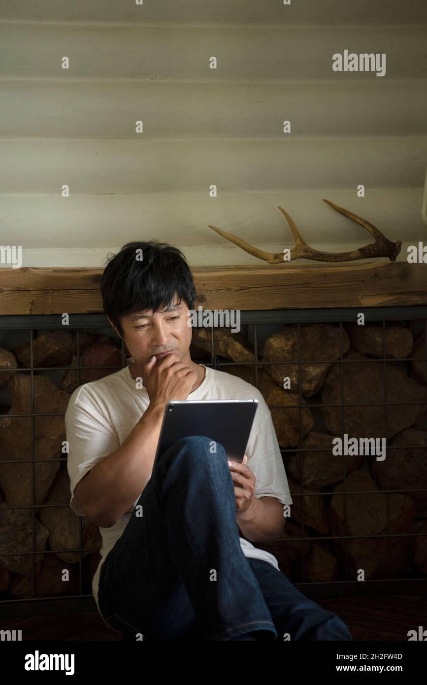 Man Watching Tablet PC Stock Photo - Alamy