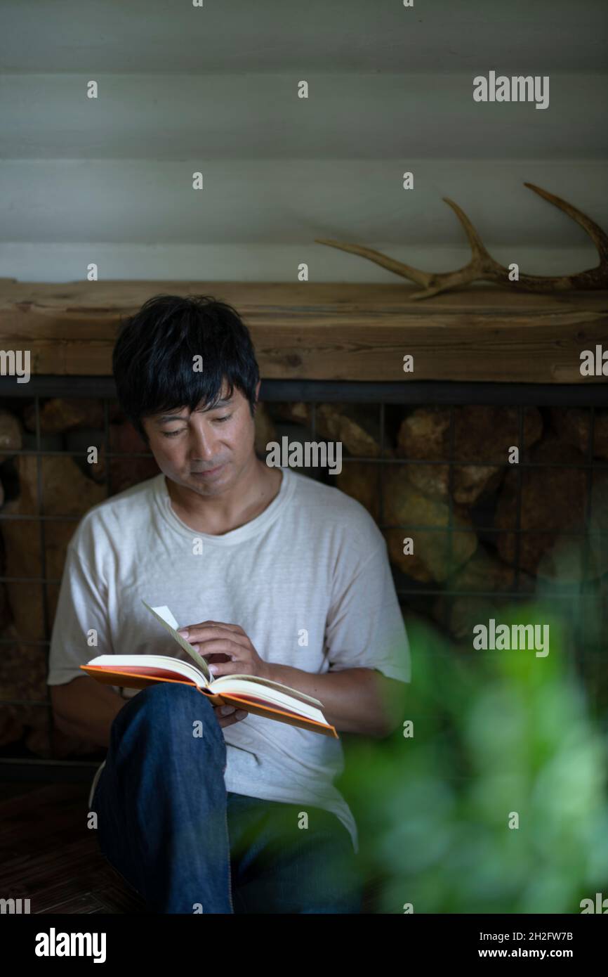 Man Reading Book Stock Photo - Alamy