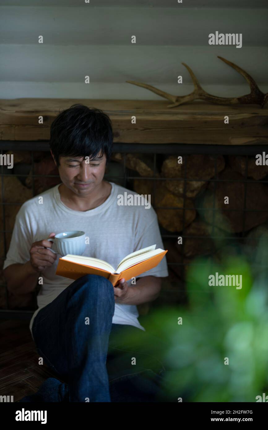 Man Reading Book Stock Photo - Alamy