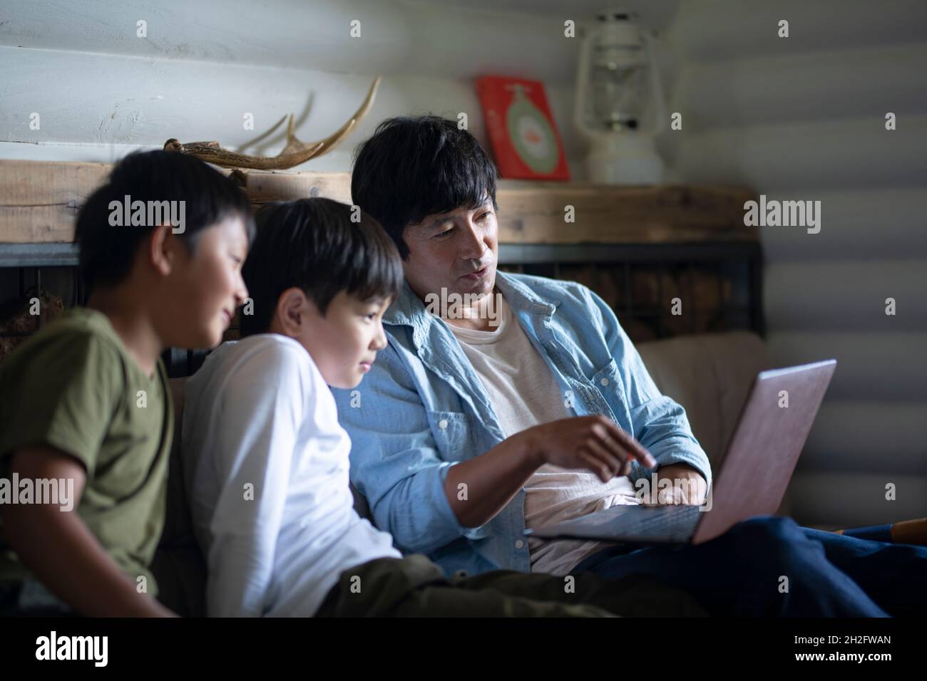 Father and Son Watching PC Stock Photo - Alamy