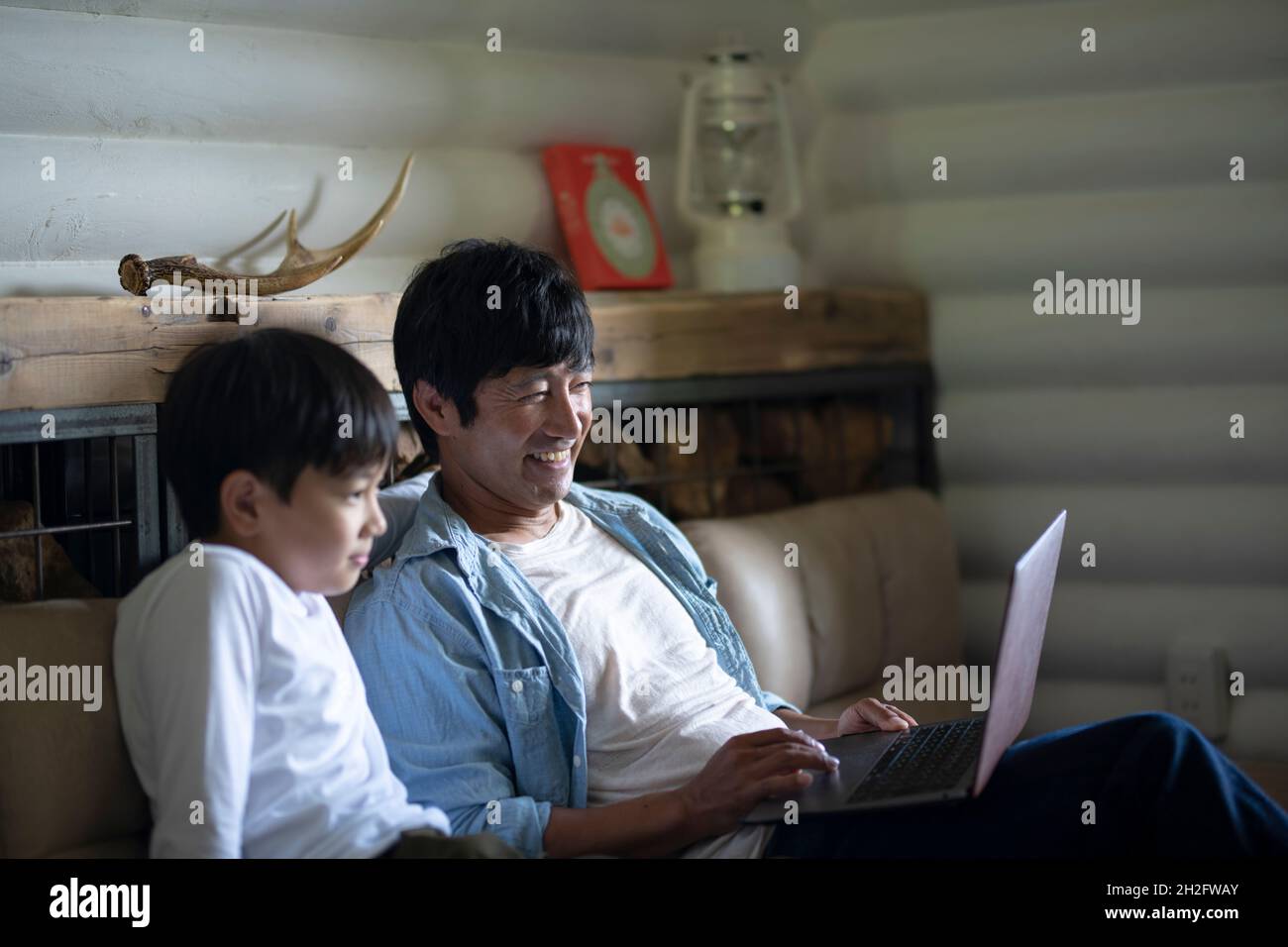 Father and Son Watching PC Stock Photo - Alamy