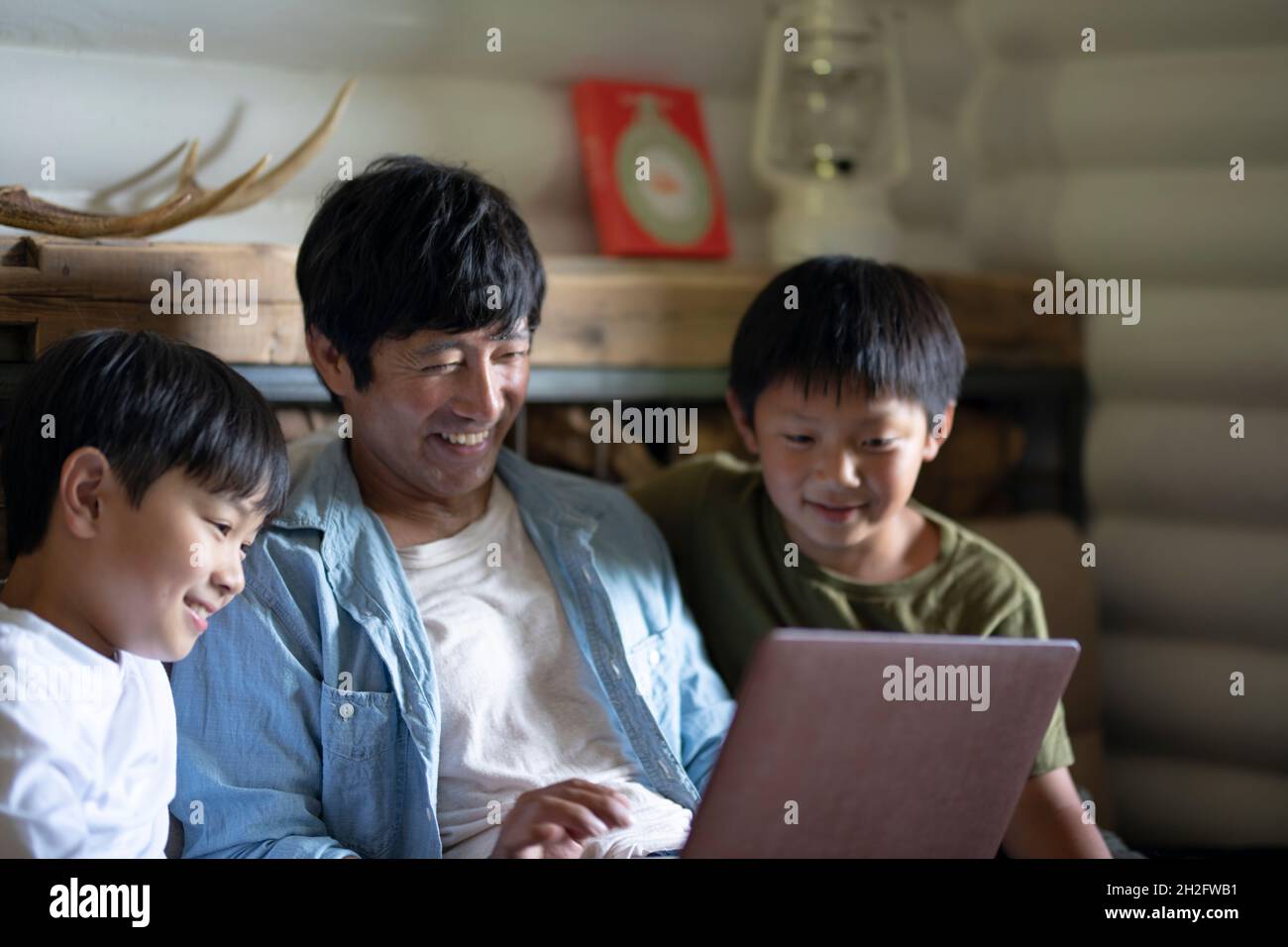 Father and Son Watching PC Stock Photo - Alamy